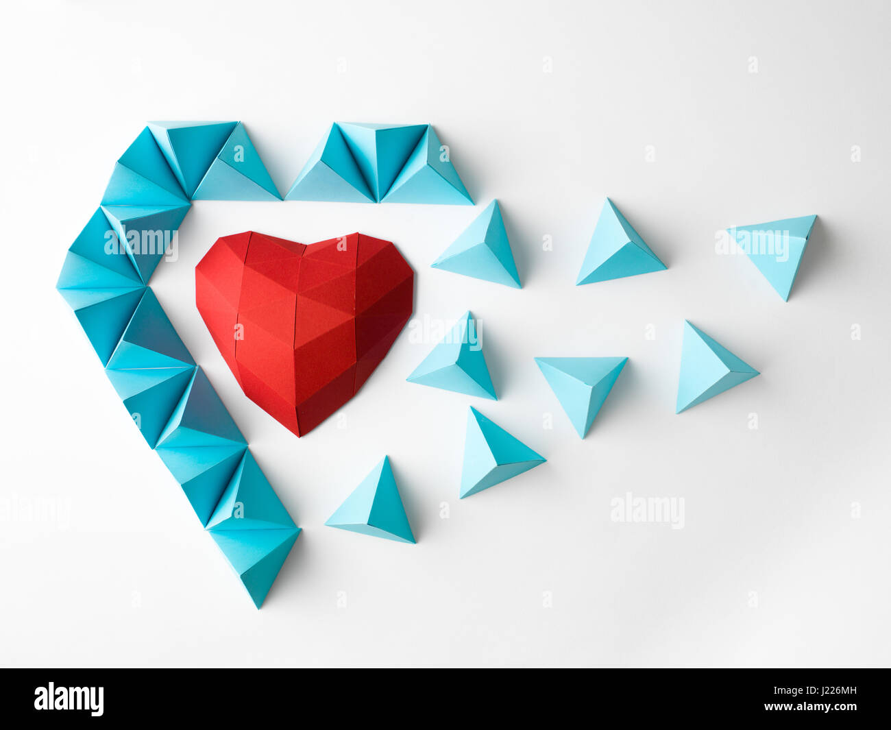 opening heart shape polygonal paper Stock Photo - Alamy
