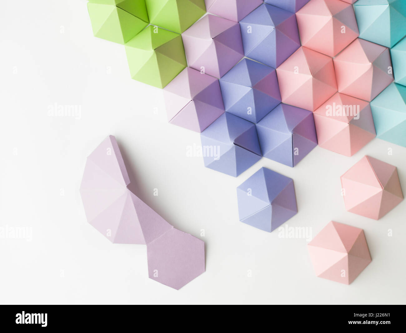 Hexagonal paper pyramid unfolded Stock Photo - Alamy