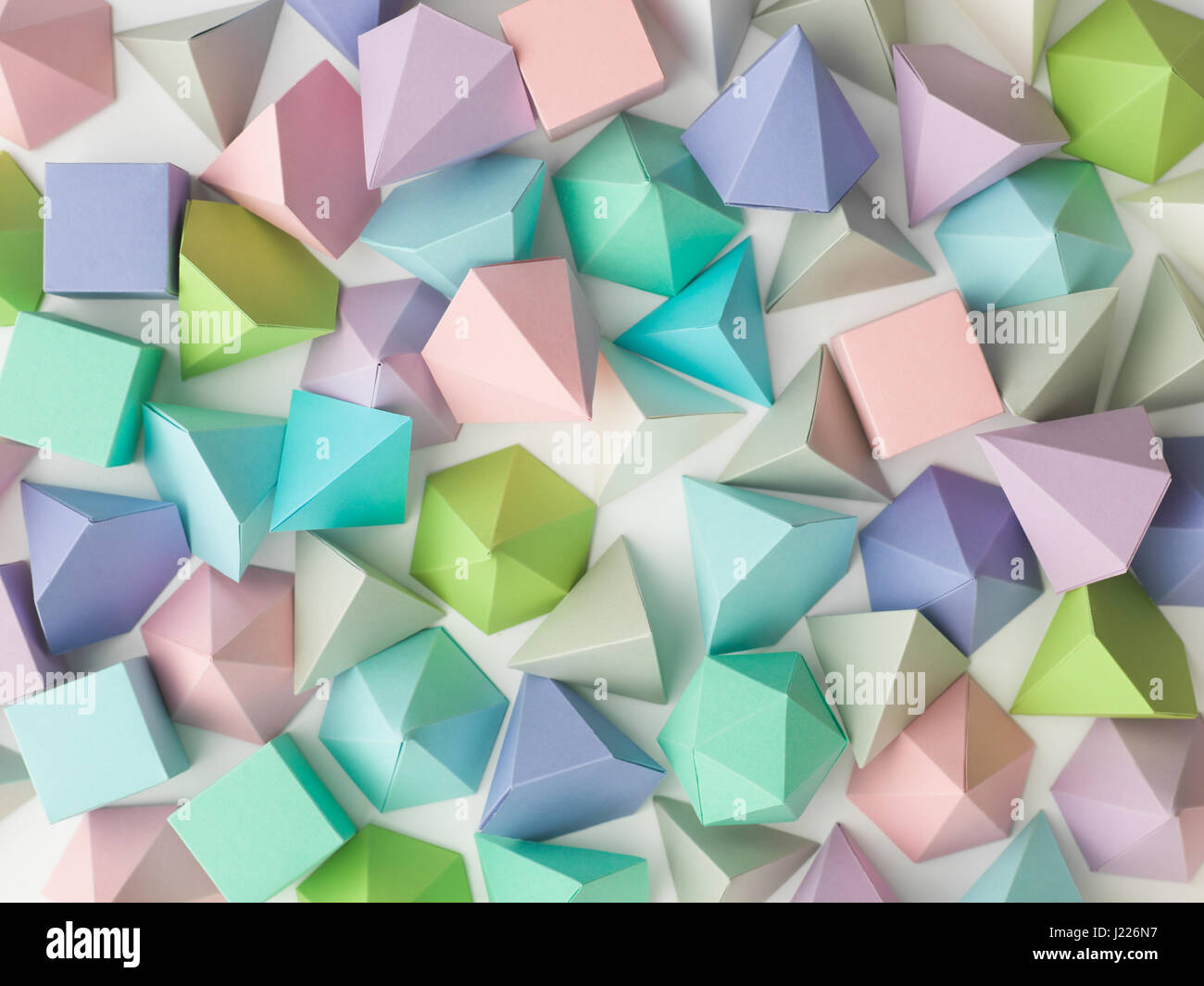 Colorful abstract geometric background with three-dimensional solid ...