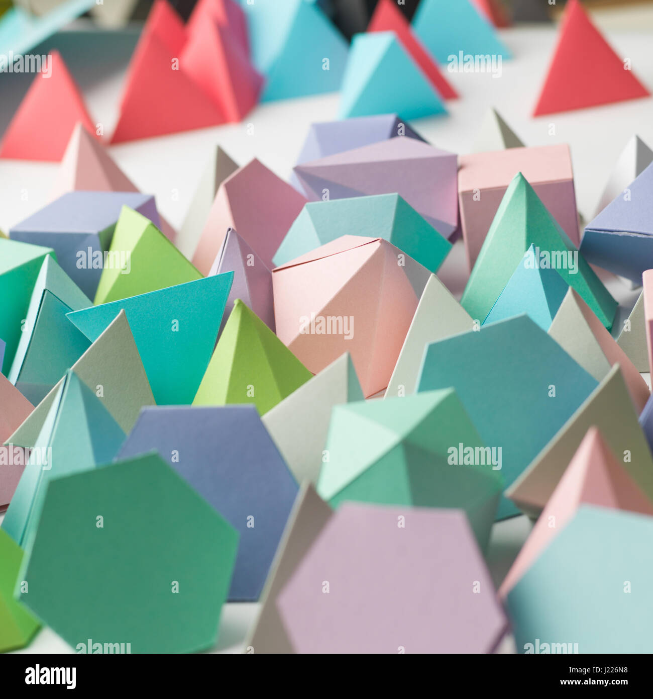 Colorful abstract geometric background with three-dimensional solid ...
