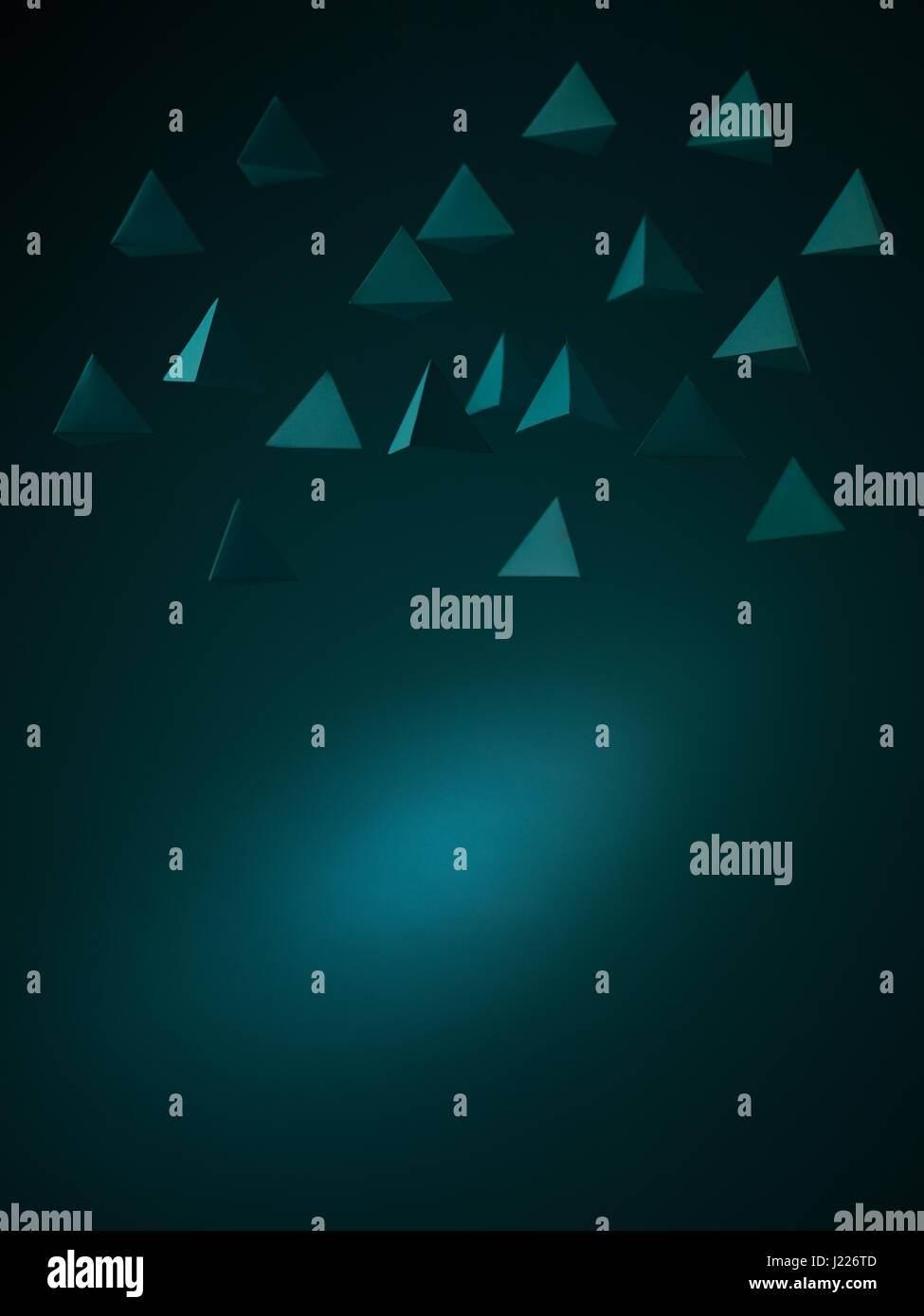 Abstract blue paper pyramid background in space. Copy space available ...