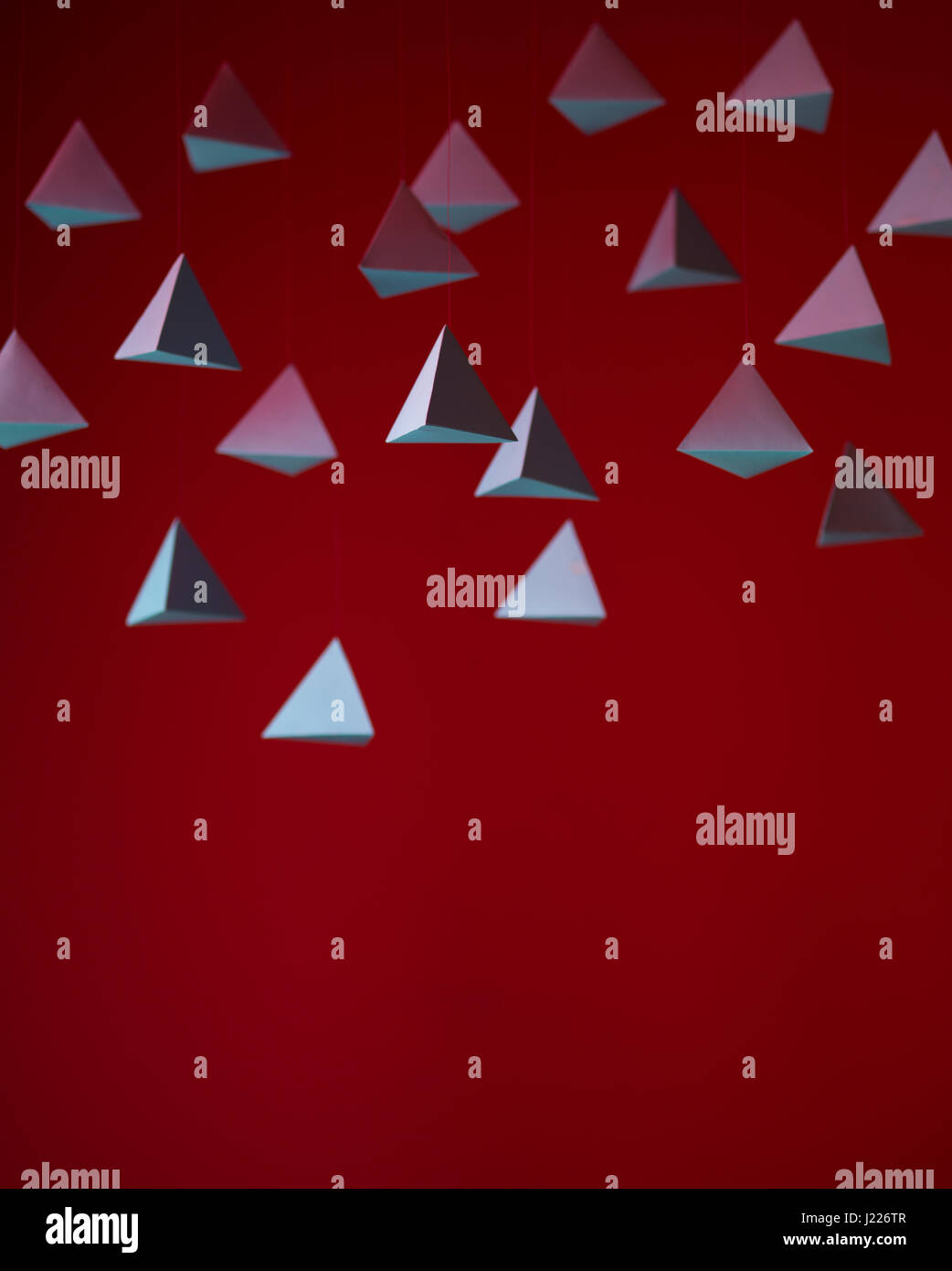 Abstract paper pyramid background in space. Copy space available ...