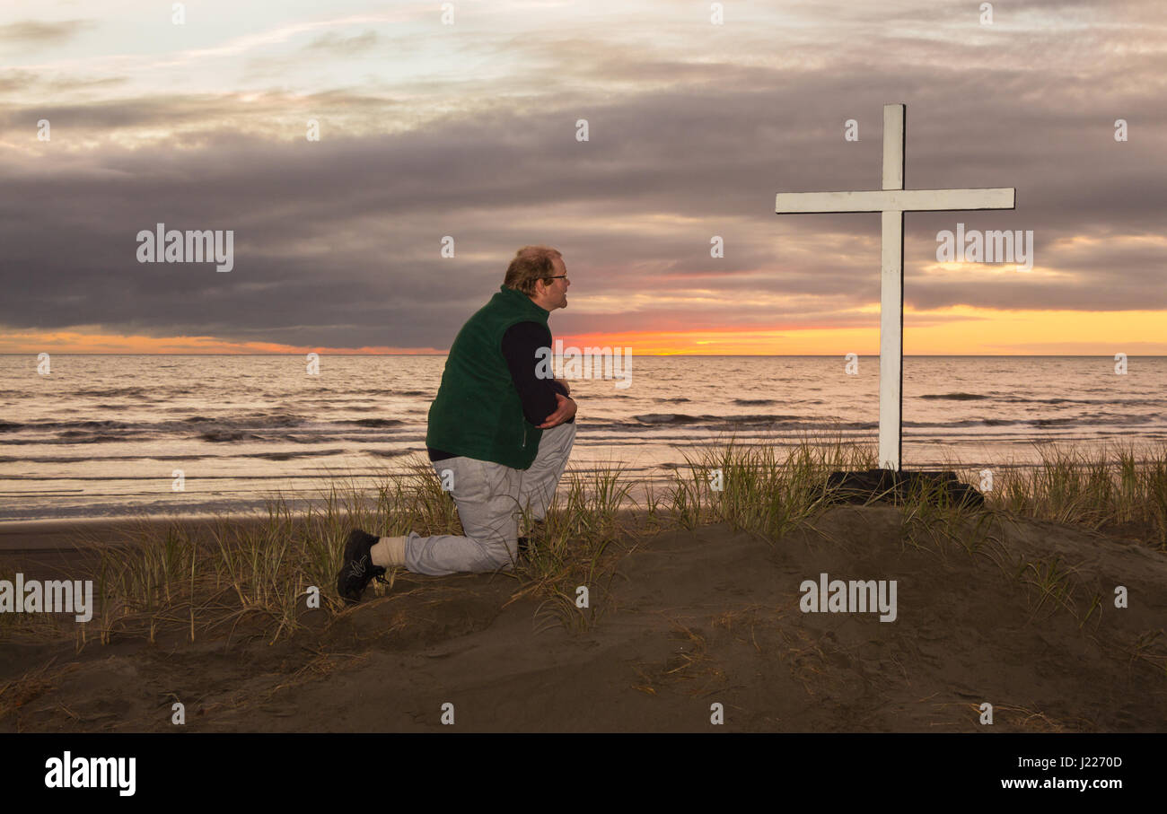 Kneeling before god hi-res stock photography and images - Alamy