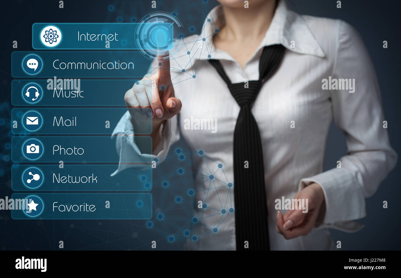Business woman clicks on the buttons on the virtual screen Stock Photo ...