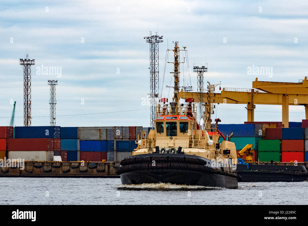 Tug ship in the cargo port of Riga, Europe Stock Photo - Alamy