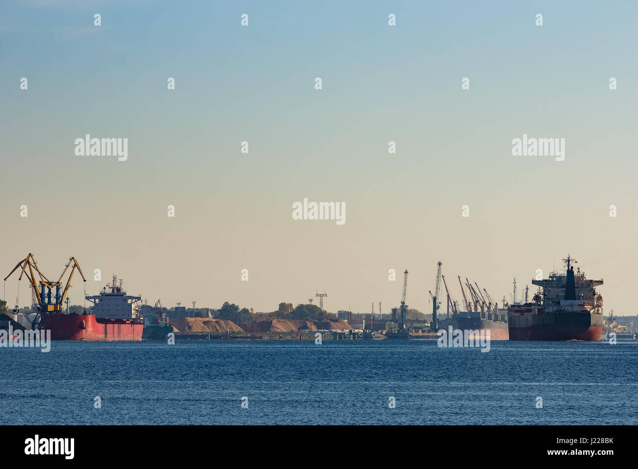 Cargo ship in the port of Riga, Europe Stock Photo - Alamy