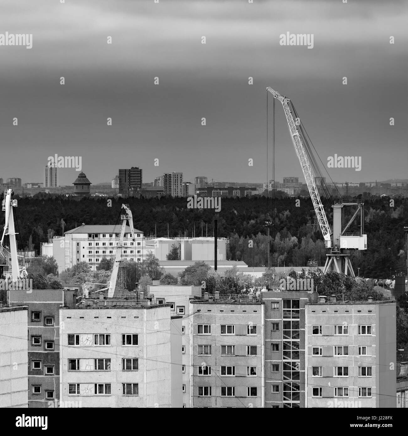 Residential area in Riga with soviet houses and cargo cranes Stock ...