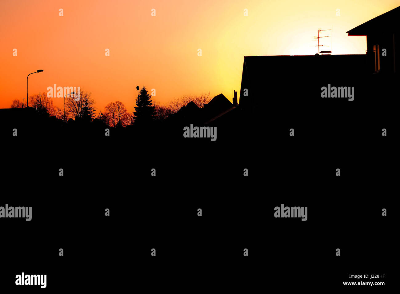 Evening townscape silhouette against the sunset sky Stock Photo - Alamy
