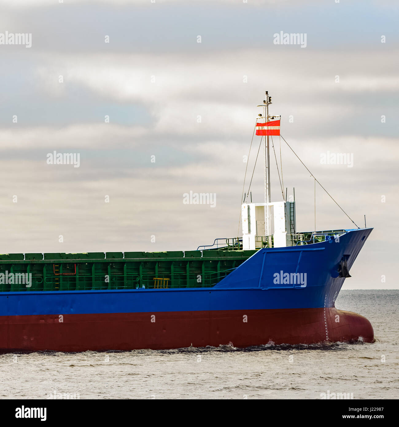 Blue cargo ship's bow leaving the port of Riga Stock Photo - Alamy