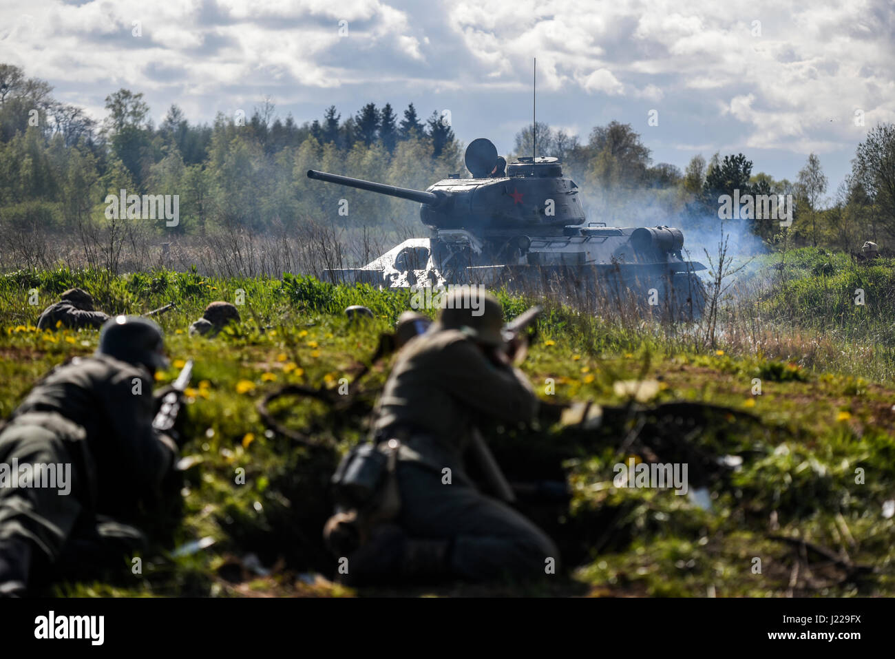 German soldiers and russian tank. Historical reconstruction, soldiers ...
