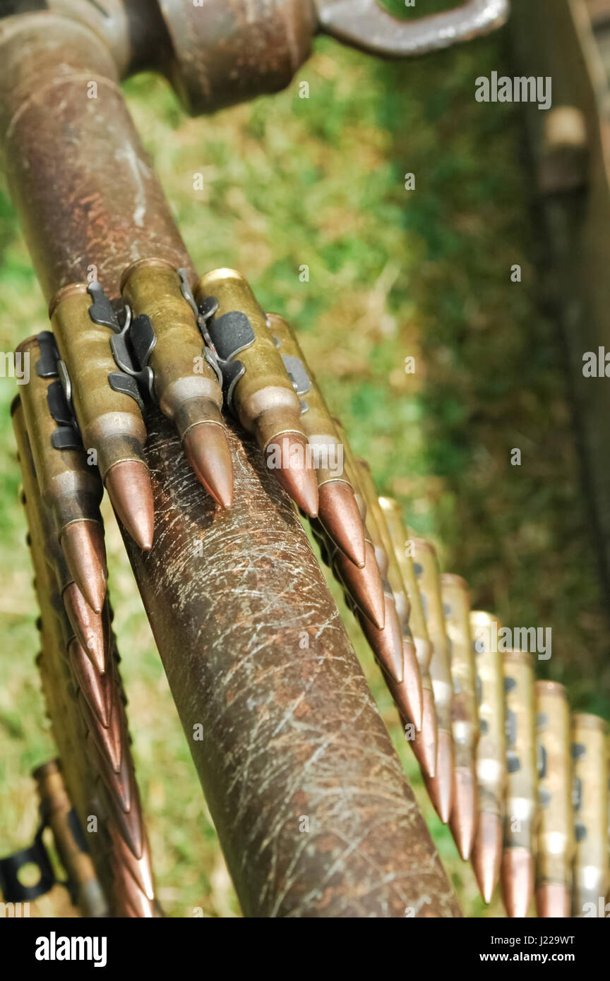 long belt of heavy machine gun bullets Stock Photo - Alamy