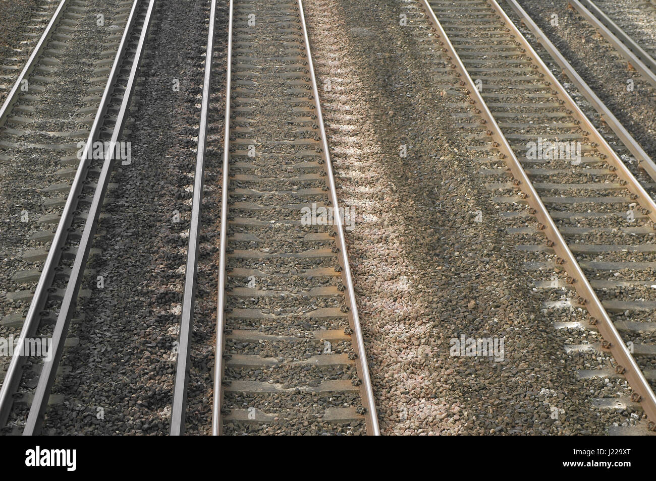 multiple railroad tracks background Stock Photo - Alamy