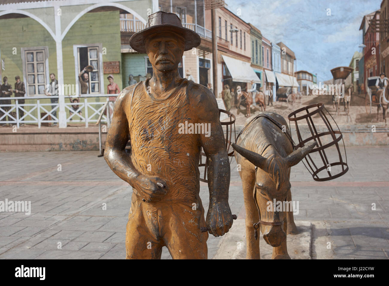 Statue of man and mule dedicated to the nitrate miners of the 18th and ...