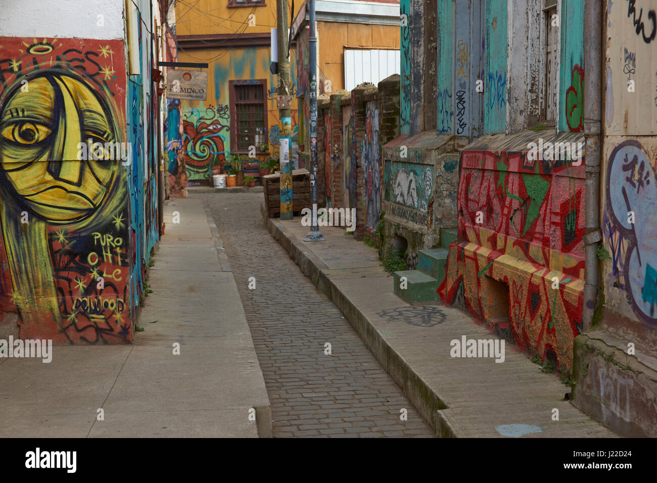 Colourful alleyway decorated with murals and urban art in the UNESCO ...