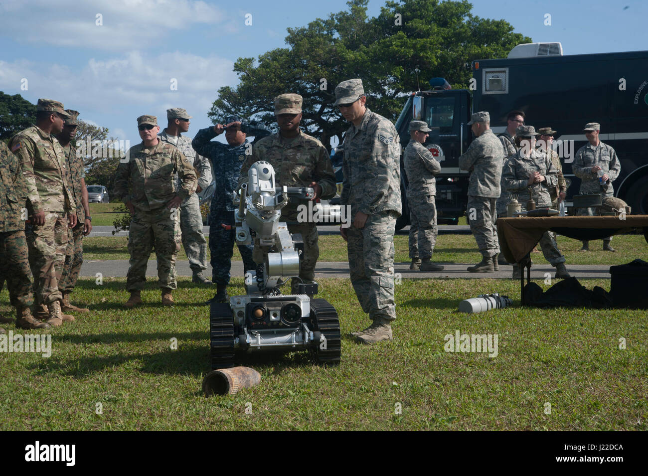 Members of different U.S. military services operate an Explosive ...
