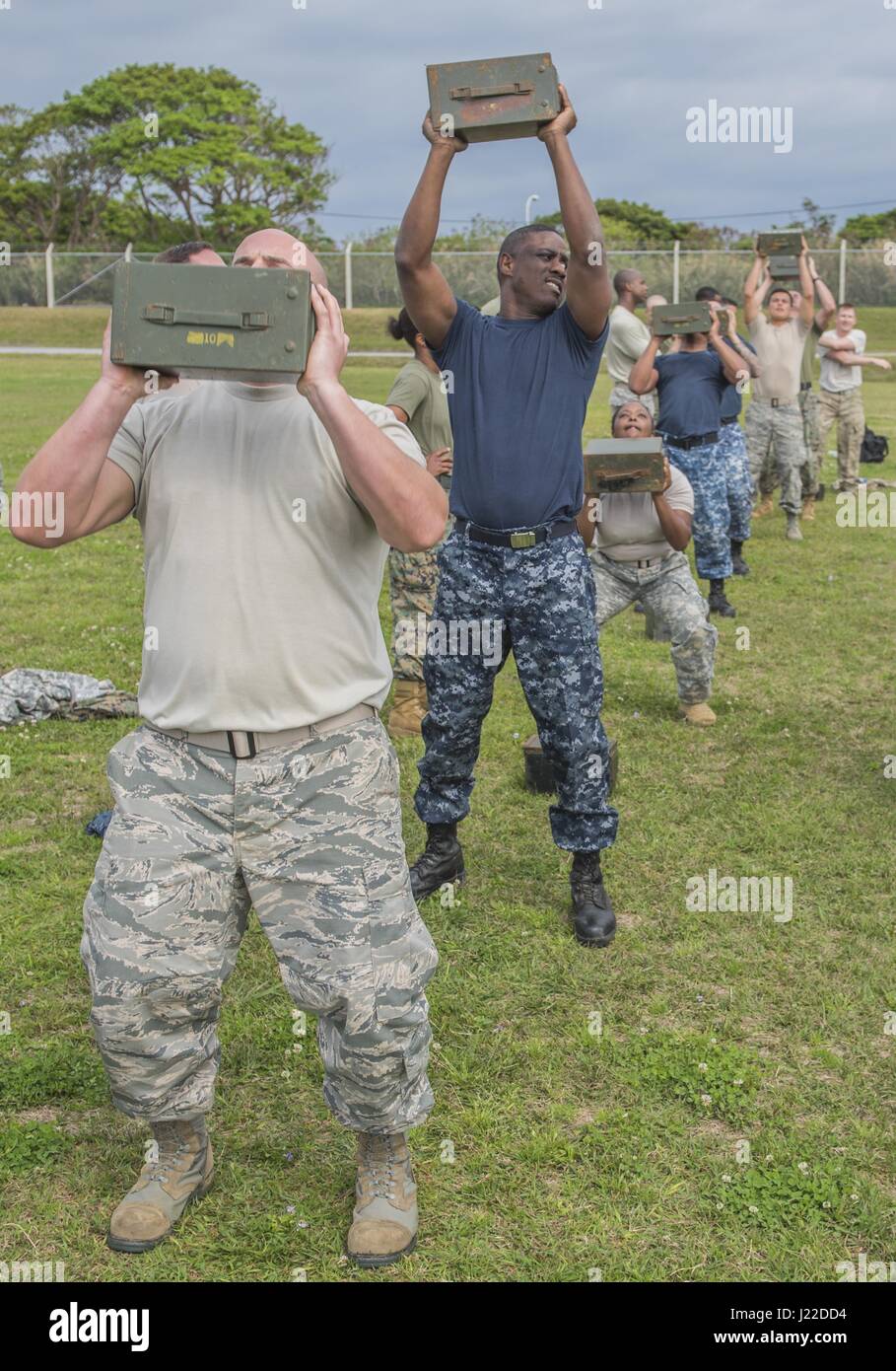 Service members participate in a portion of a U.S. Marine Corps fitness ...