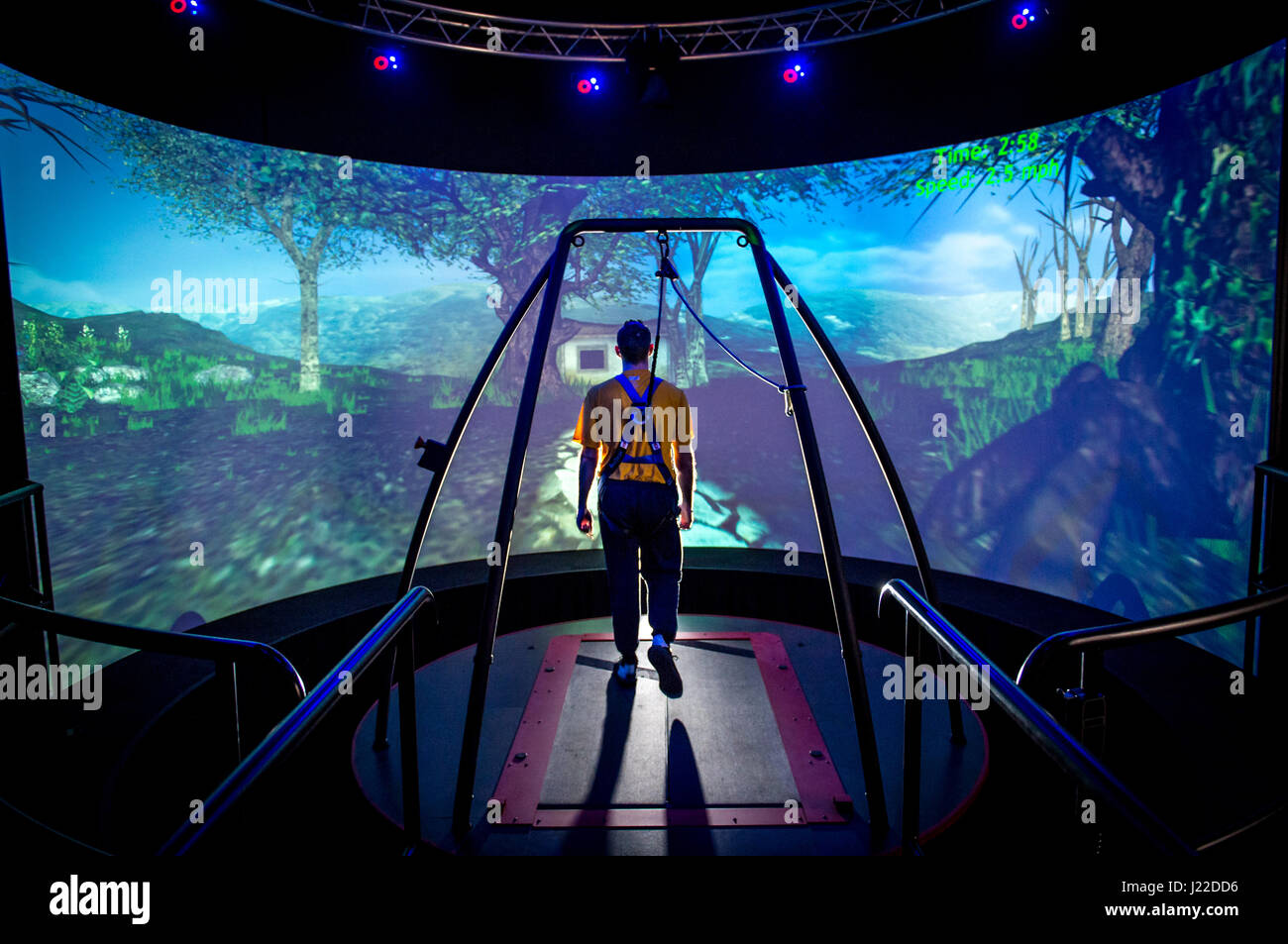 A Traumatic Brain Injury (TBI) patient walks through a virtual reality ...