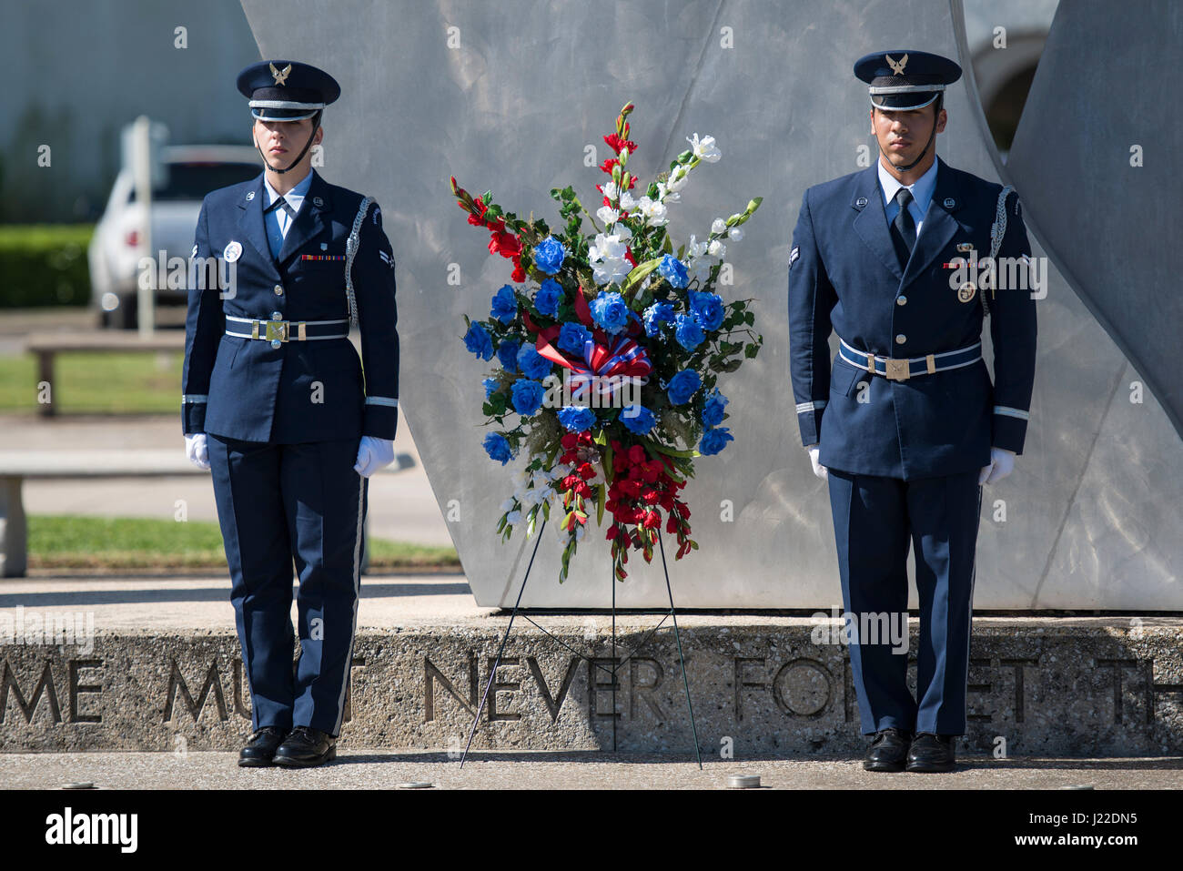 Joint Base San Antonio Honor Guard members lay a wreath at the Missing ...