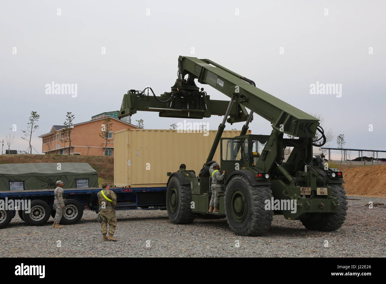 A soldier from 551st Inland Cargo Transfer Company, 498th Combat ...