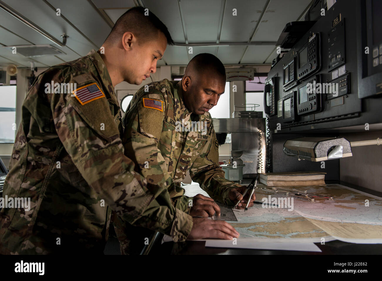 Spc. Huy Dinh and Sgt. Nigel Sonnylal, U.S. Army Reserve watercraft ...