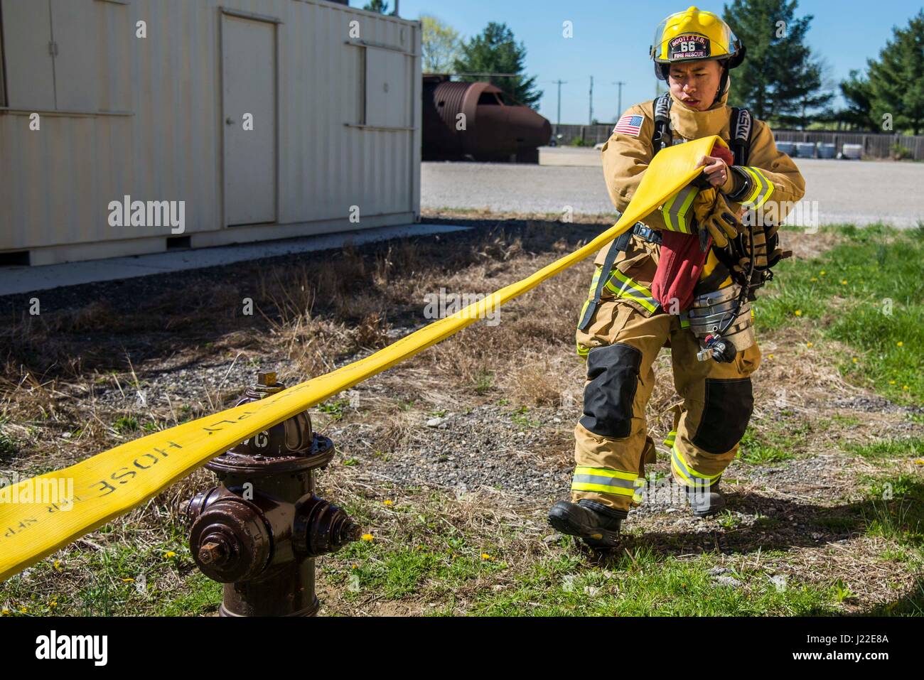 Firefighters with the 375th Civil Engineer Squadron perform drills in ...
