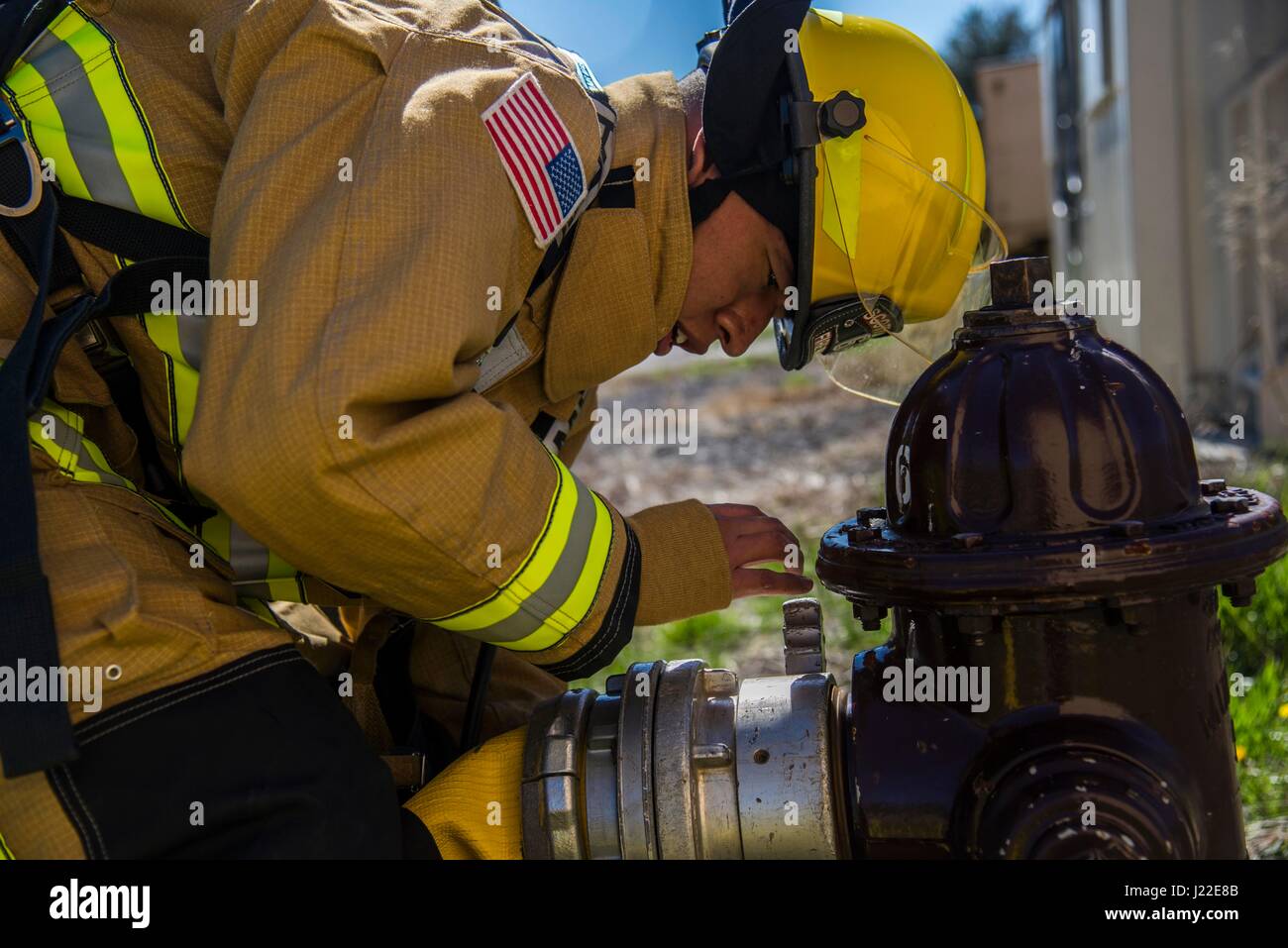 Firefighters with the 375th Civil Engineer Squadron perform drills in ...