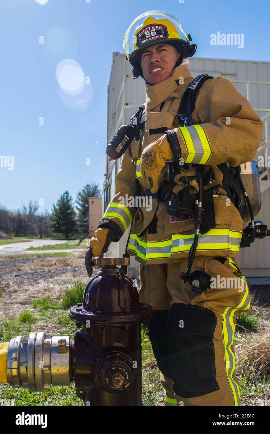 Firefighters with the 375th Civil Engineer Squadron perform drills in ...