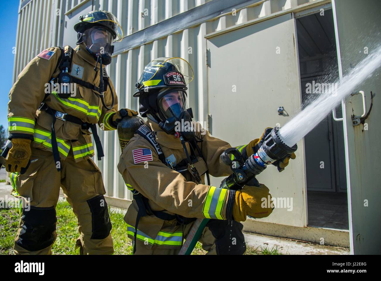 Firefighters with the 375th Civil Engineer Squadron perform drills in ...
