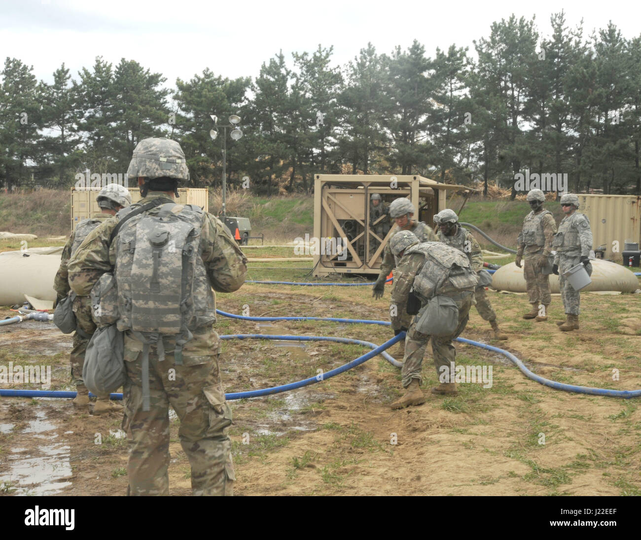 Soldiers assigned to the 339th Quartermaster Company set up a Tactical ...