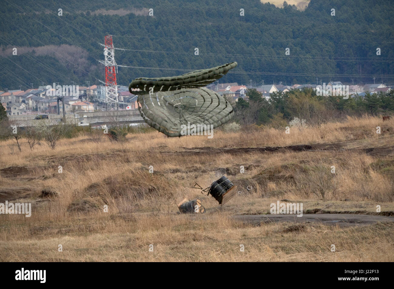 Containerized delivery system bundles drop on a drop zone at Combined ...