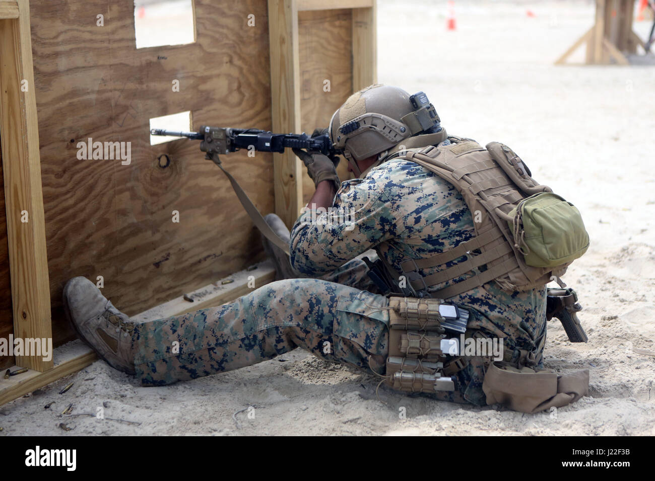 A Marine from 2nd Reconnaissance Battalion engages targets on a close ...