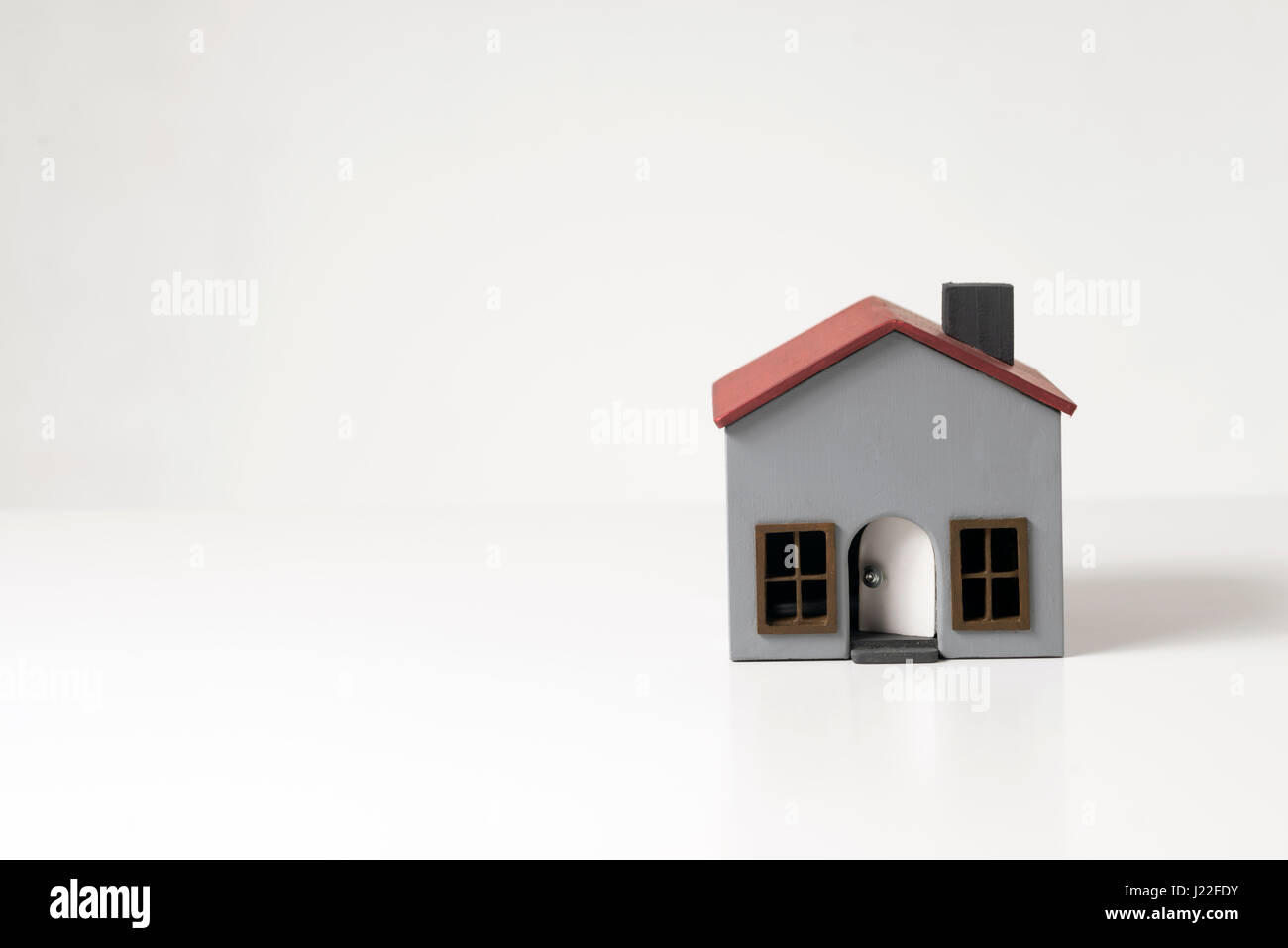Model house on a white background Stock Photo - Alamy