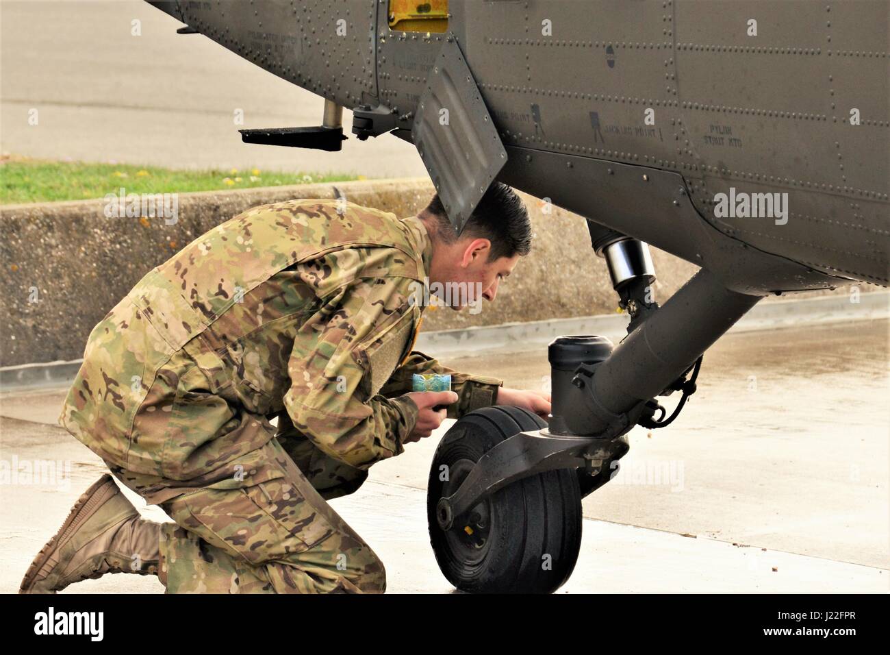 U.S. Army Spc. Richard Ehrman, a UH-60 Black Hawk crew chief (15T ...