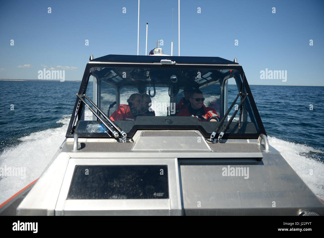 A boat crew from U.S. Coast Guard Station Cape Cod Canal is on patrol ...