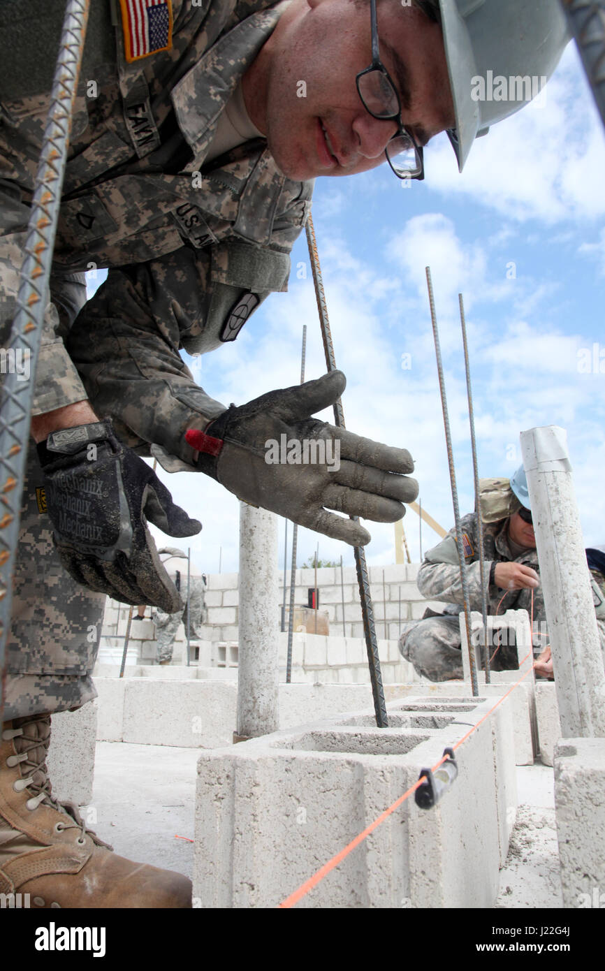 U.S. Army Pfc. Iemanuel Fayn with the 808th Engineer Company, is ...