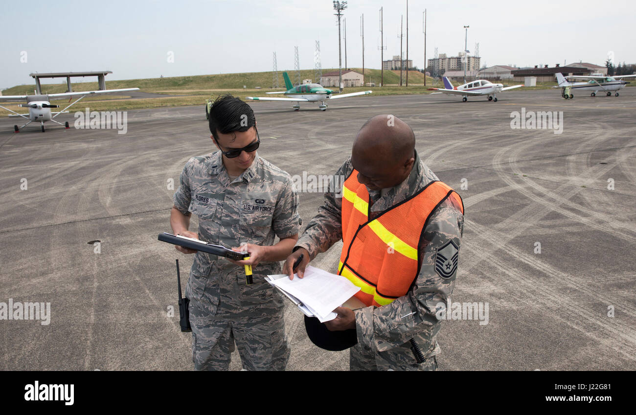 1st Lt. Carlos Flores, 374th Operations Support Squadron, and Master ...