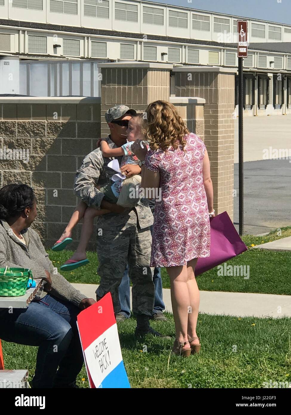 Senior Airman Anthony Green, 46th Aerial Port Squadron, kisses his ...