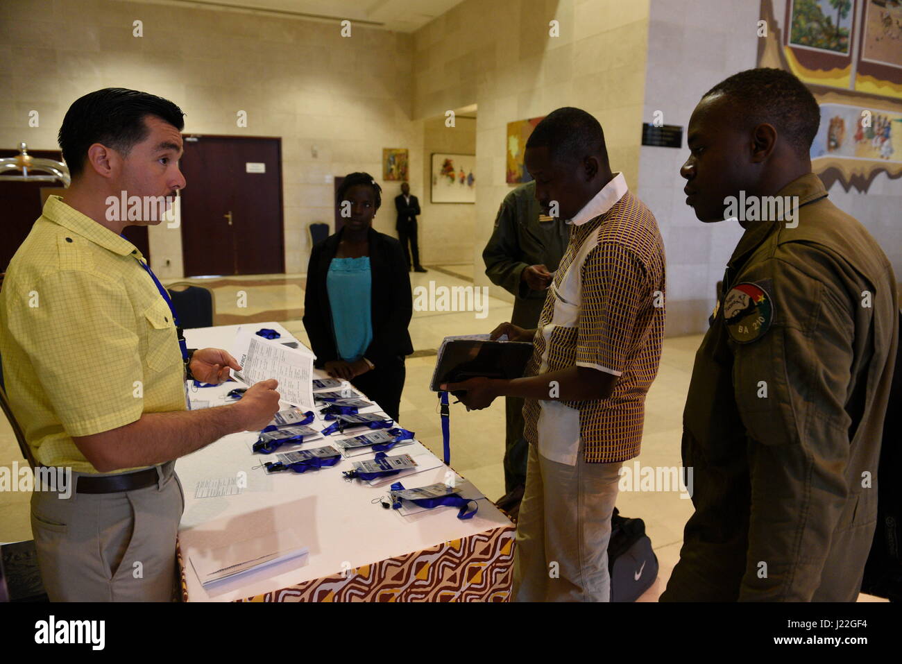 U.S. Air Force Master Sgt. Henry Lopez, left, welcomes Burkino Faso air ...