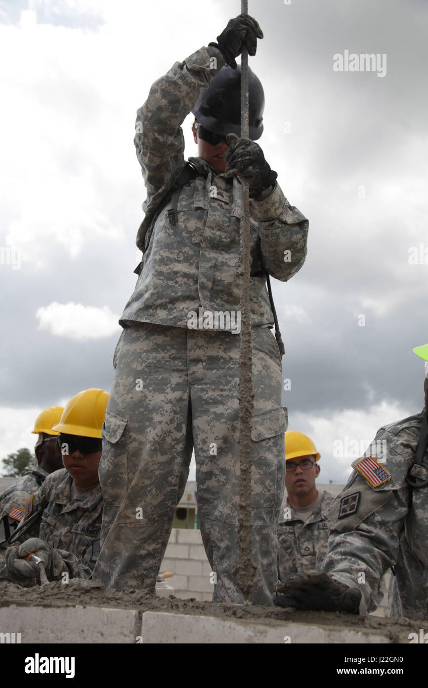 U.S. Army Sgt. Bethany Bartley, with the 808th Engineer Company, places ...
