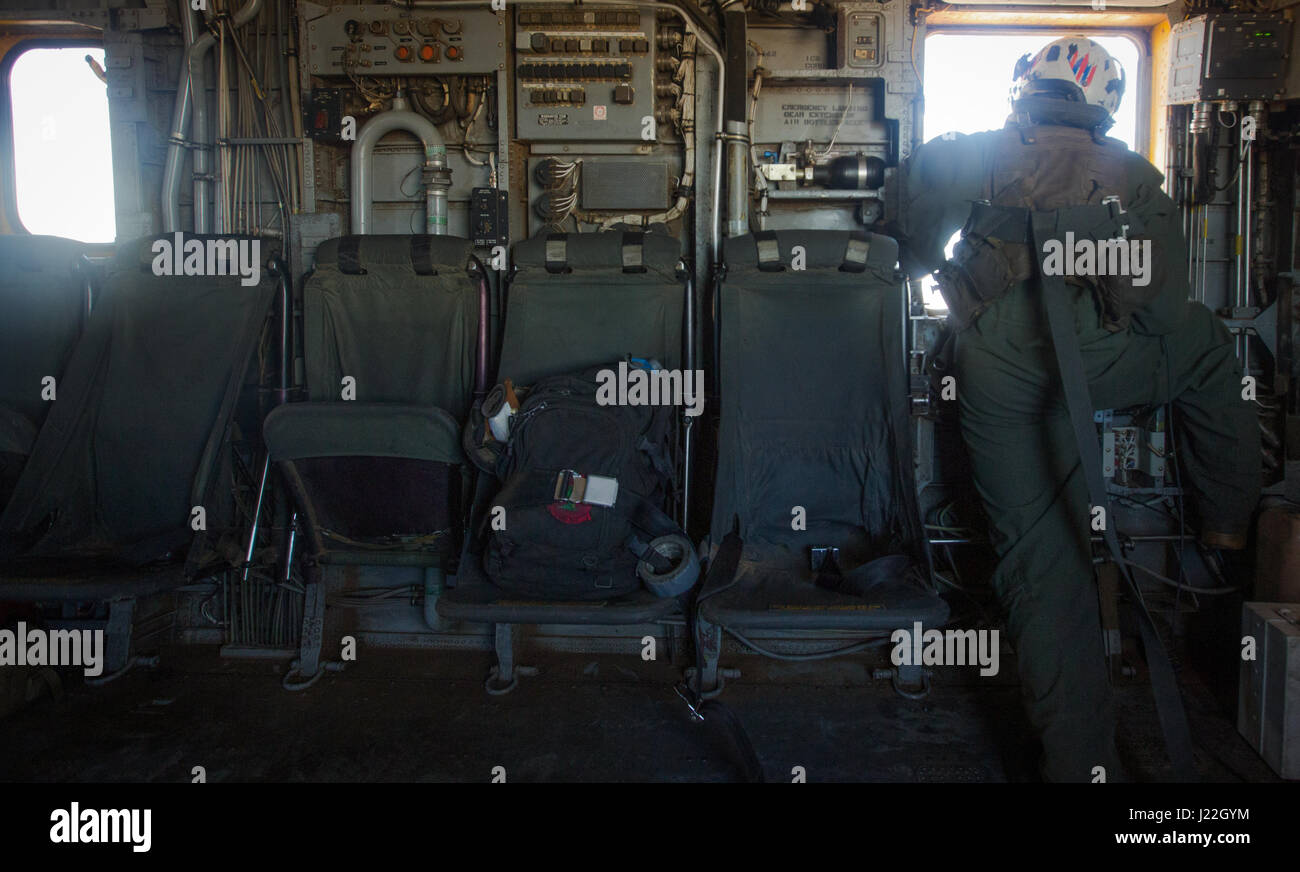 A Marine crew chief with HMH-466 conducts section landing drills in CH ...