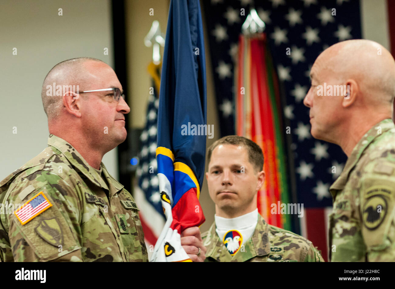 U.S. Army Reserve Command Sgt. Maj. Ted L. Copeland, left, accepts the ...