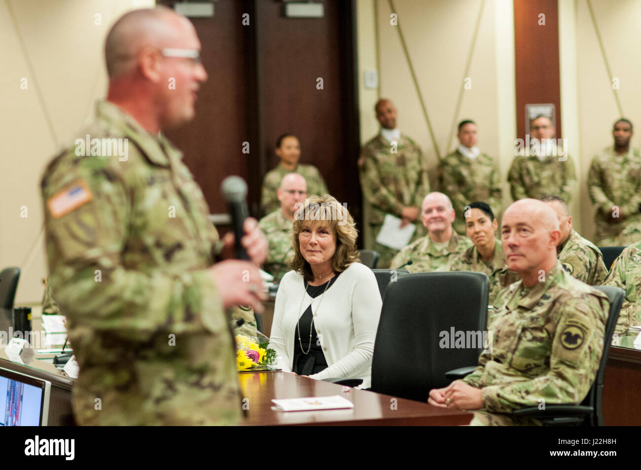 Grace Copeland, seated, listens to her husband, U.S. Army Reserve ...