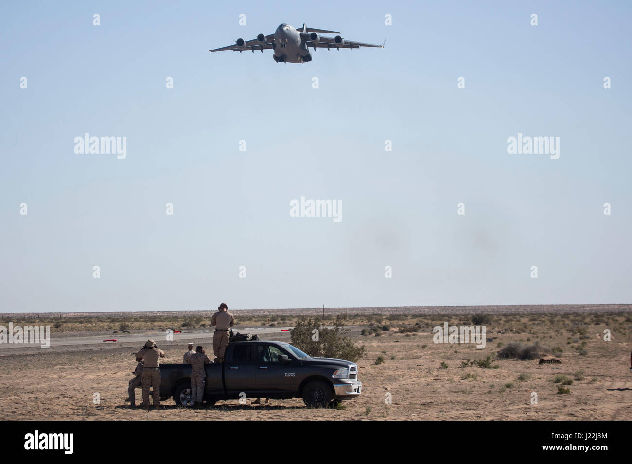 A U.S. Marine Corps Air Traffic Control Mobile Team (MMT) watches an ...