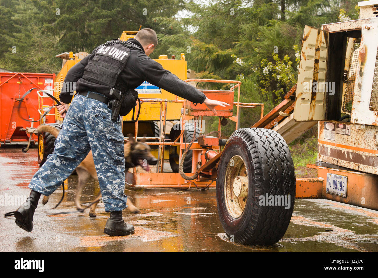 A Navy Military Working Dog conducts detection training with Master-at ...