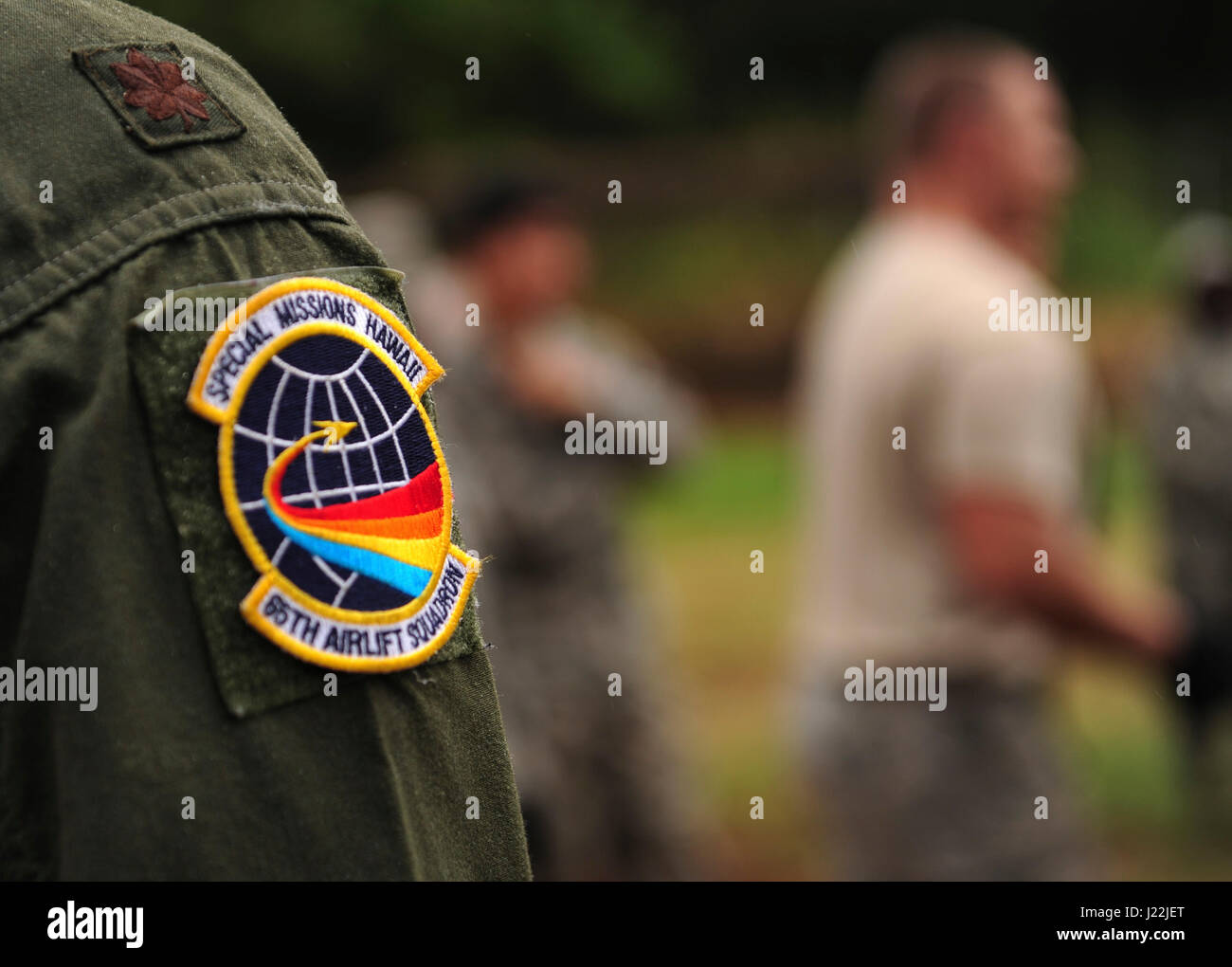 Maj. Andrew Conwell, 65th Airlift Squadron C-40 pilot, watches a aid ...