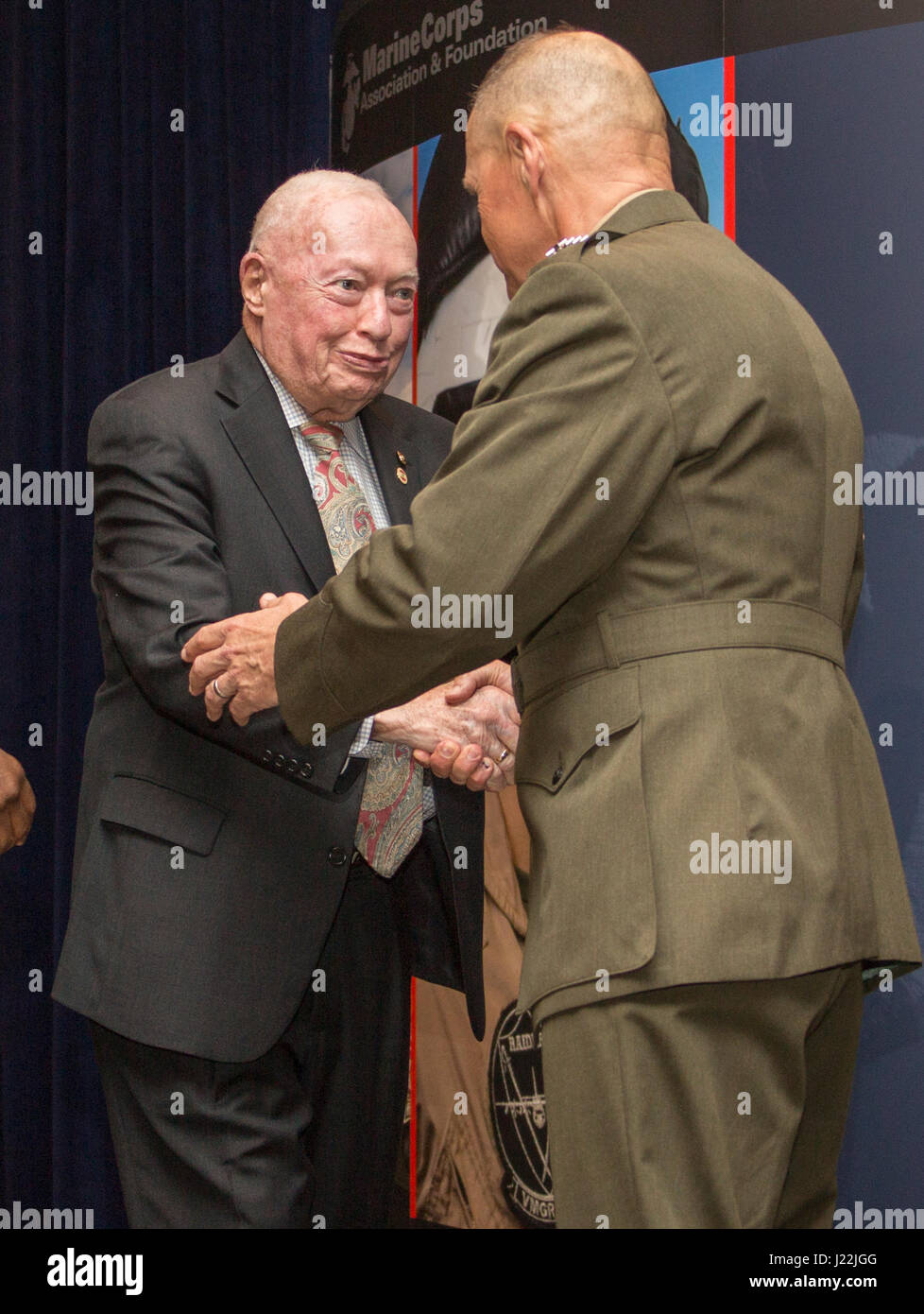 Commandant of the Marine Corps Gen. Robert B. Neller, right, shakes ...