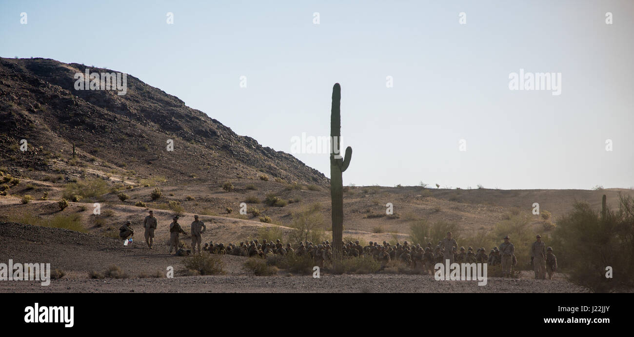 Marines with 2nd Battalion, 6th Marine Regiment, await their flight by ...