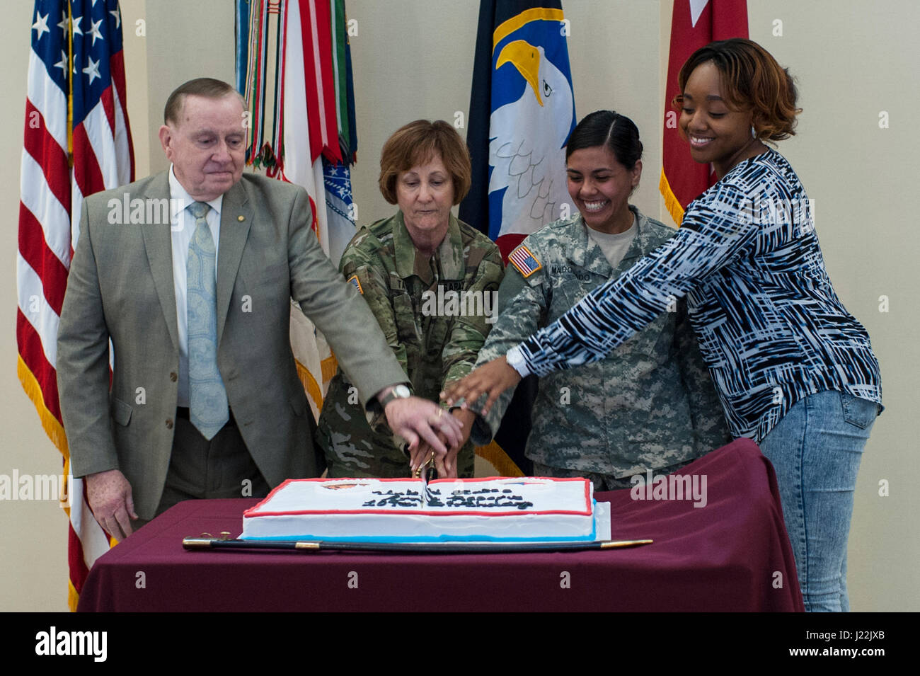 (L-R) Rexford Davis, representing the senior civilian at the U.S. Army ...