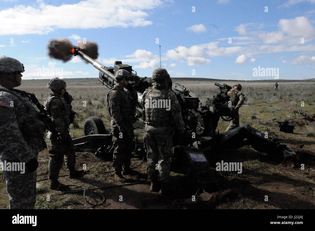 Soldiers of 1st Battalion 17th Field Artillery Battery fire their M-777 ...