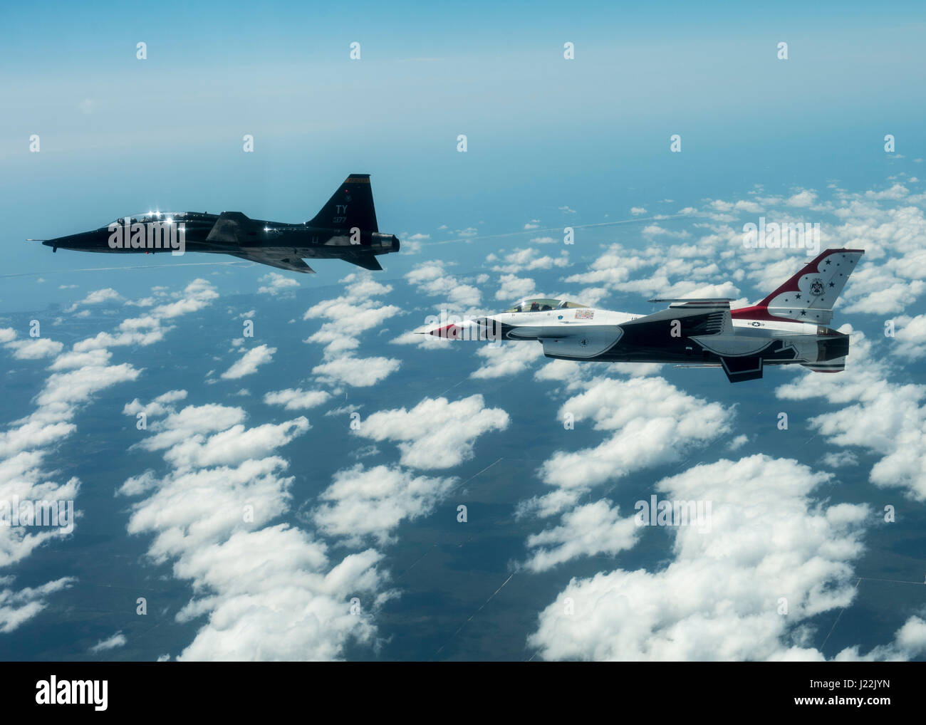 A Thunderbird demonstration team aircraft flew in a two-ship formation ...